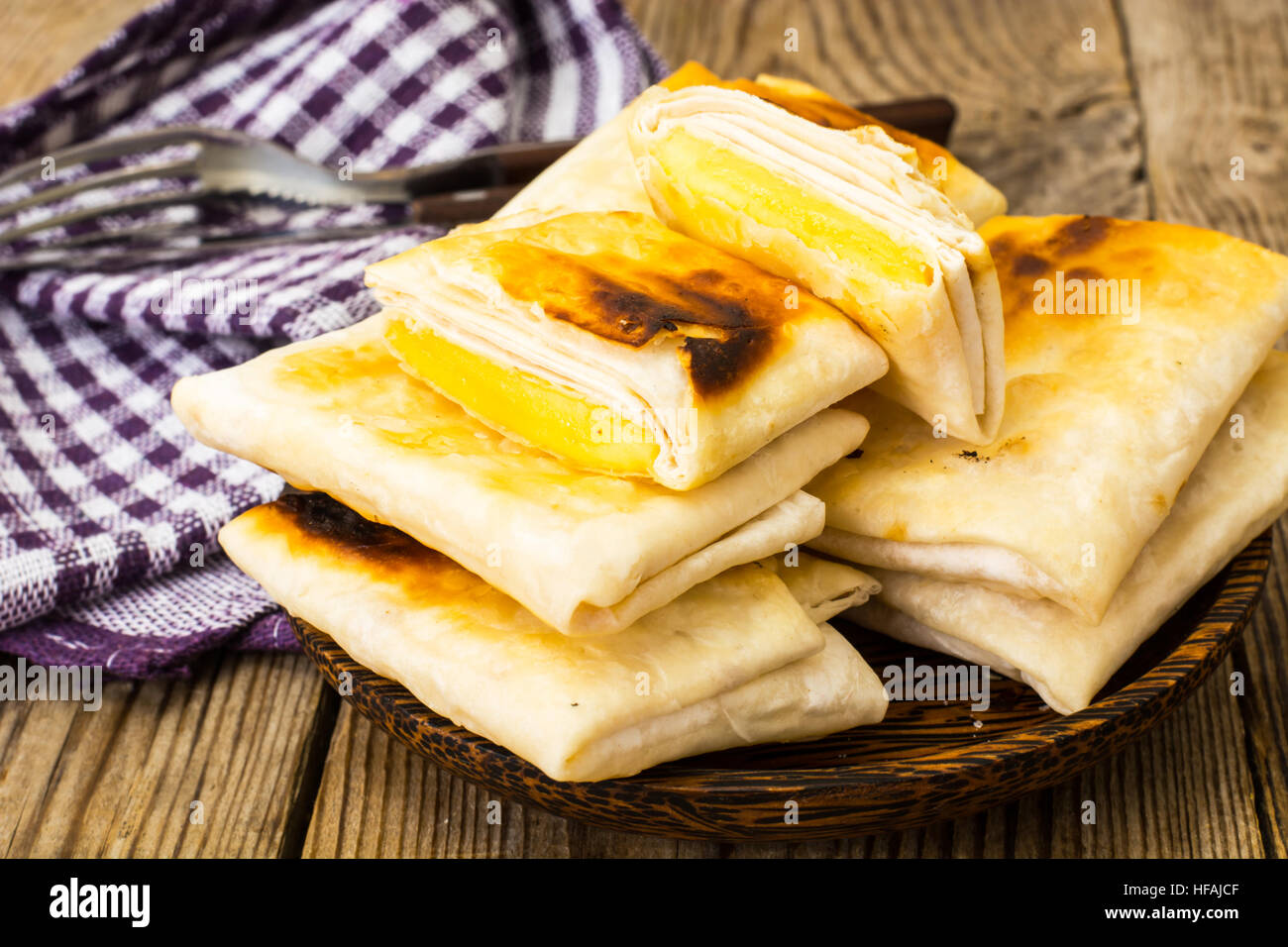 Fried pita bread with cheese Stock Photo - Alamy