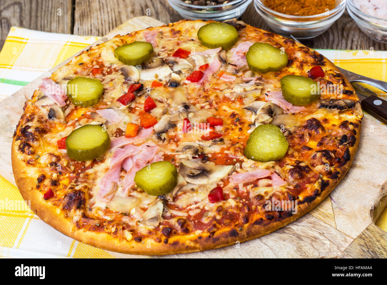 Homemade pizza with ham and mushrooms Stock Photo - Alamy