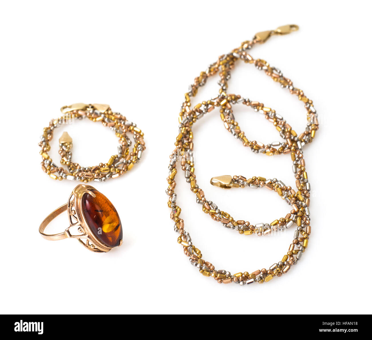 Gold Jewellery with amber Stock Photo - Alamy