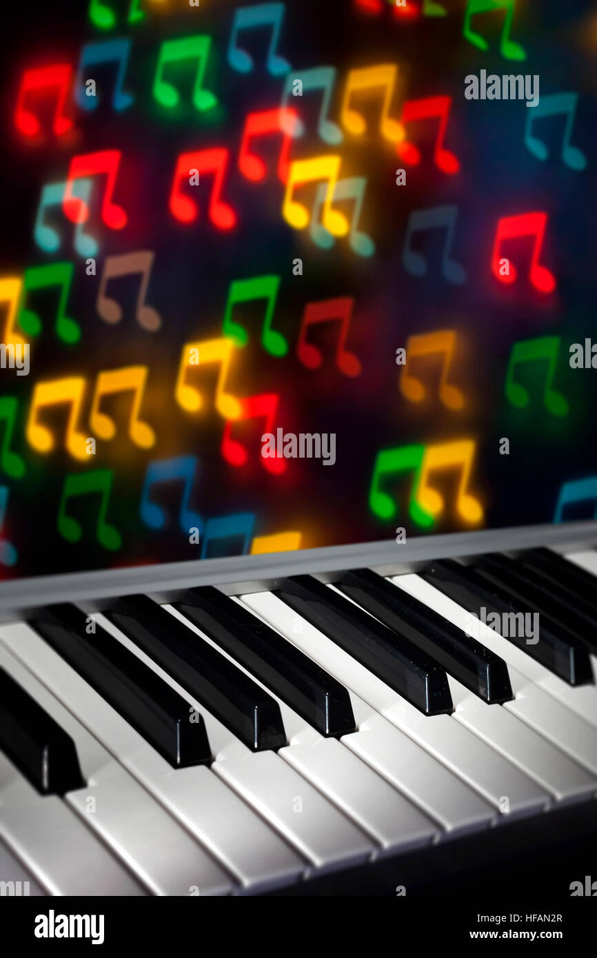 Piano Keyboard with Bokeh Notes Stock Photo - Alamy