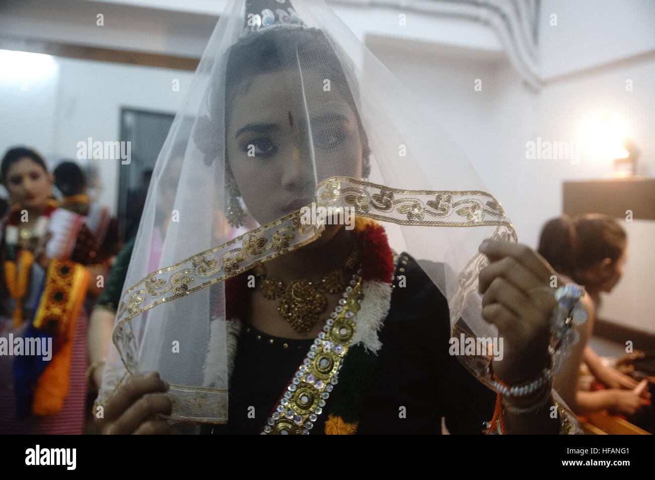 Dhaka, Bangladesh. 28th Dec, 2016. Bangladeshi Manipuri artist poses ...