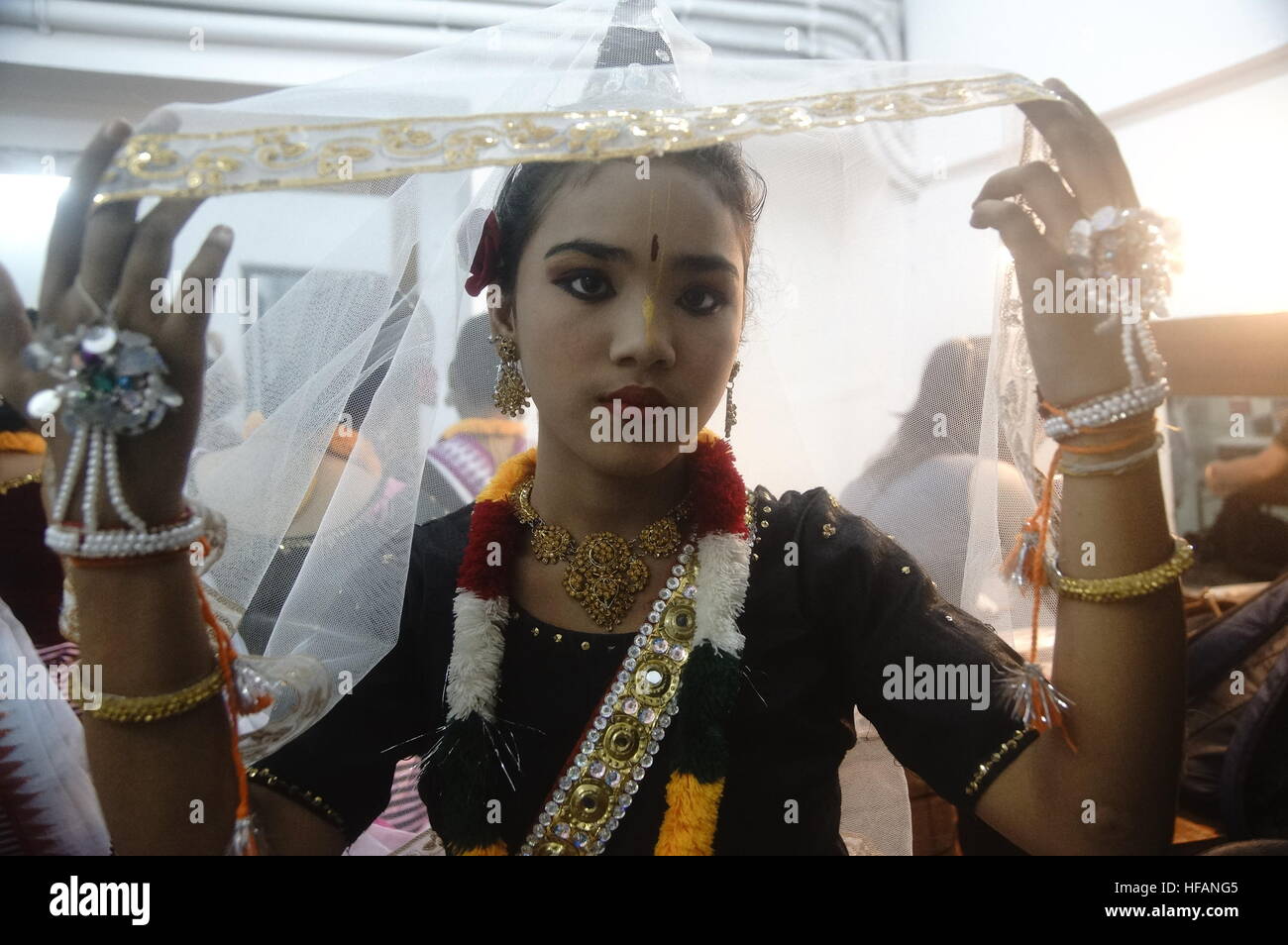 Dhaka, Bangladesh. 28th Dec, 2016. Bangladeshi Manipuri artist poses ...