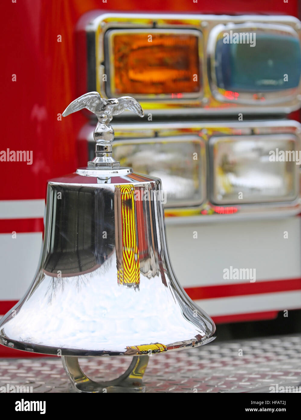 American fire truck fire engine with gleaming eagle symbol above the ...