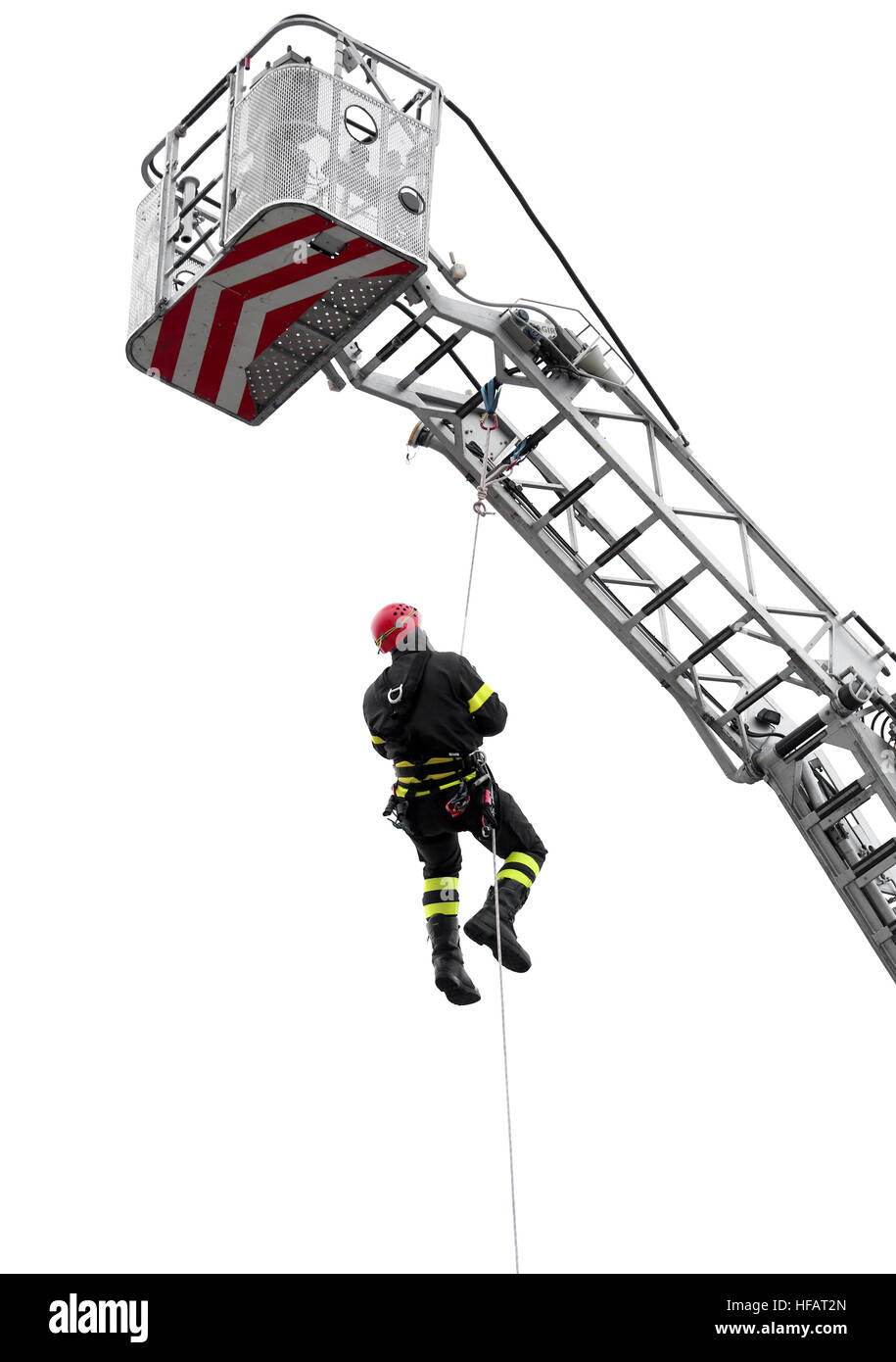 firefighter with red helmet falls from the ladder truck basket on the ...
