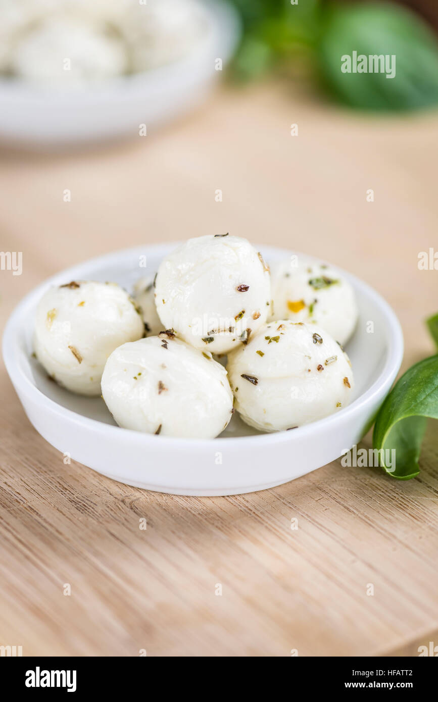 Portion of small Mozzarella Cheese (marinated with herbs; selective ...