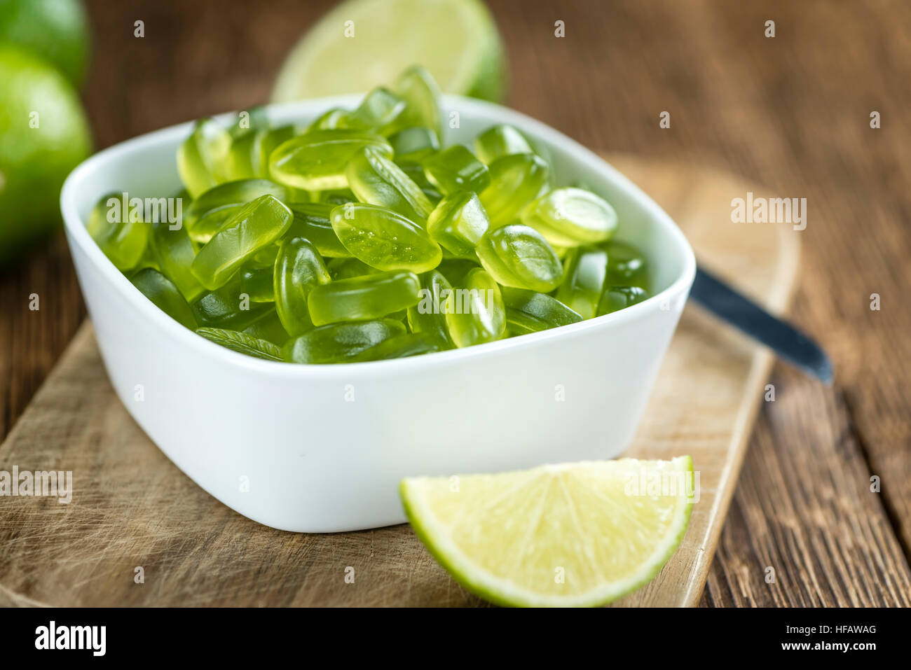 Gummy Candy with lime taste (selective focus) on wooden background ...