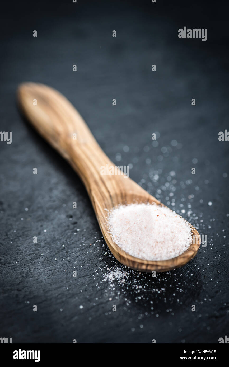 Portion of Himalayan Salt on a rustic slate slab (selective focus ...