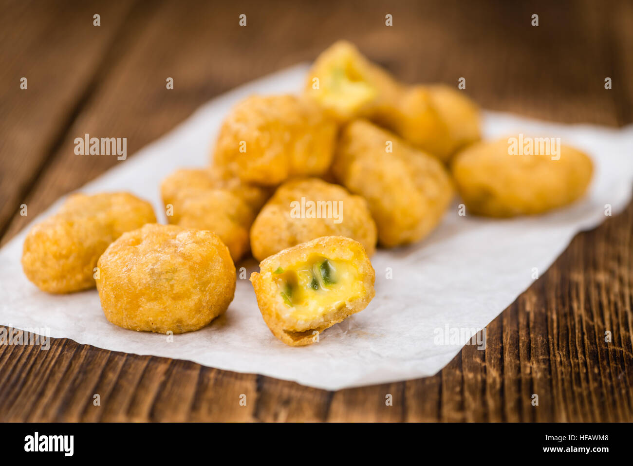 Homemade Cheese Nuggets (with Chilis) on vintage background (selective ...