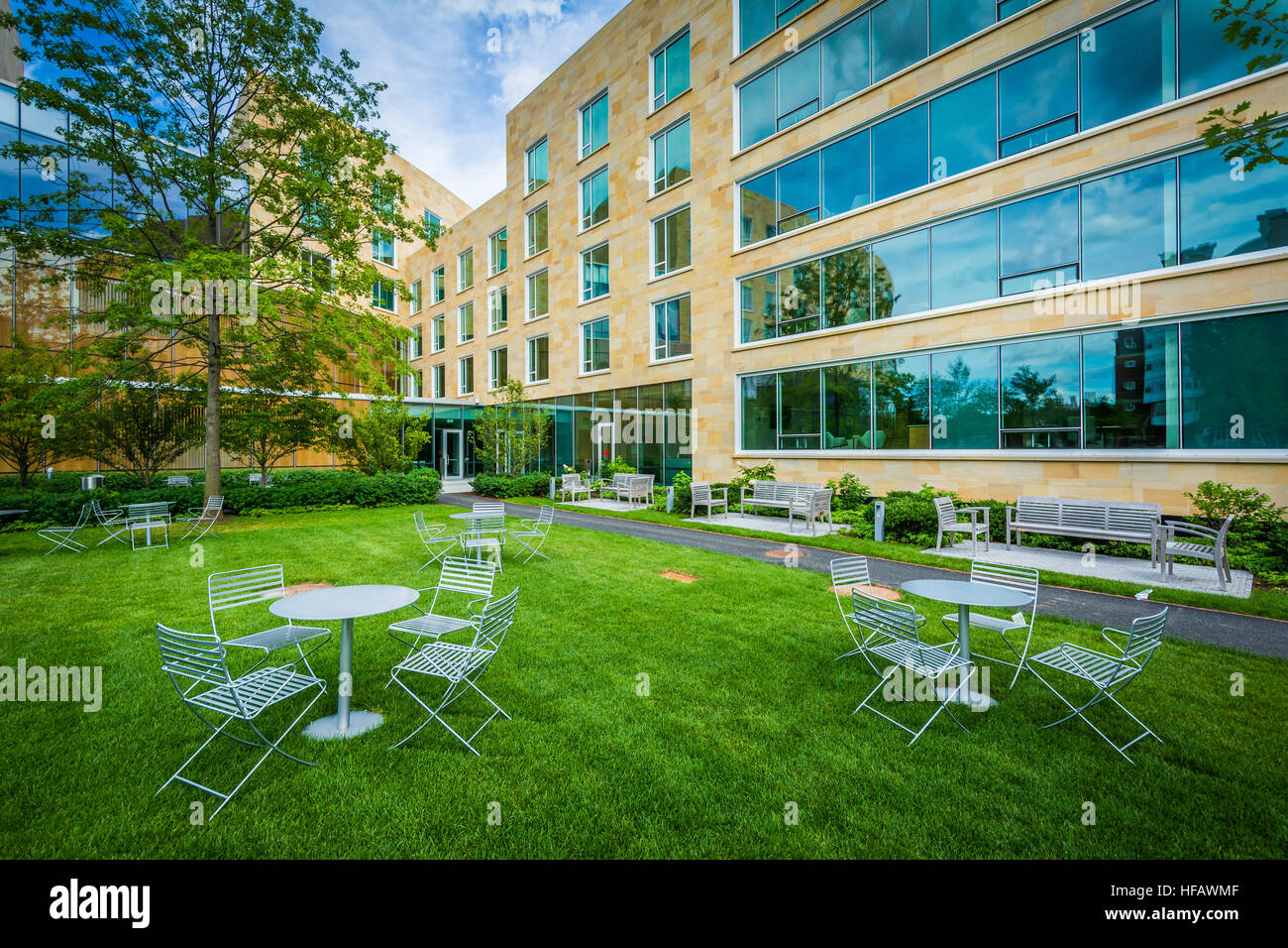 Tables and chairs, and Tata Hall, at Harvard Business School, in Boston ...