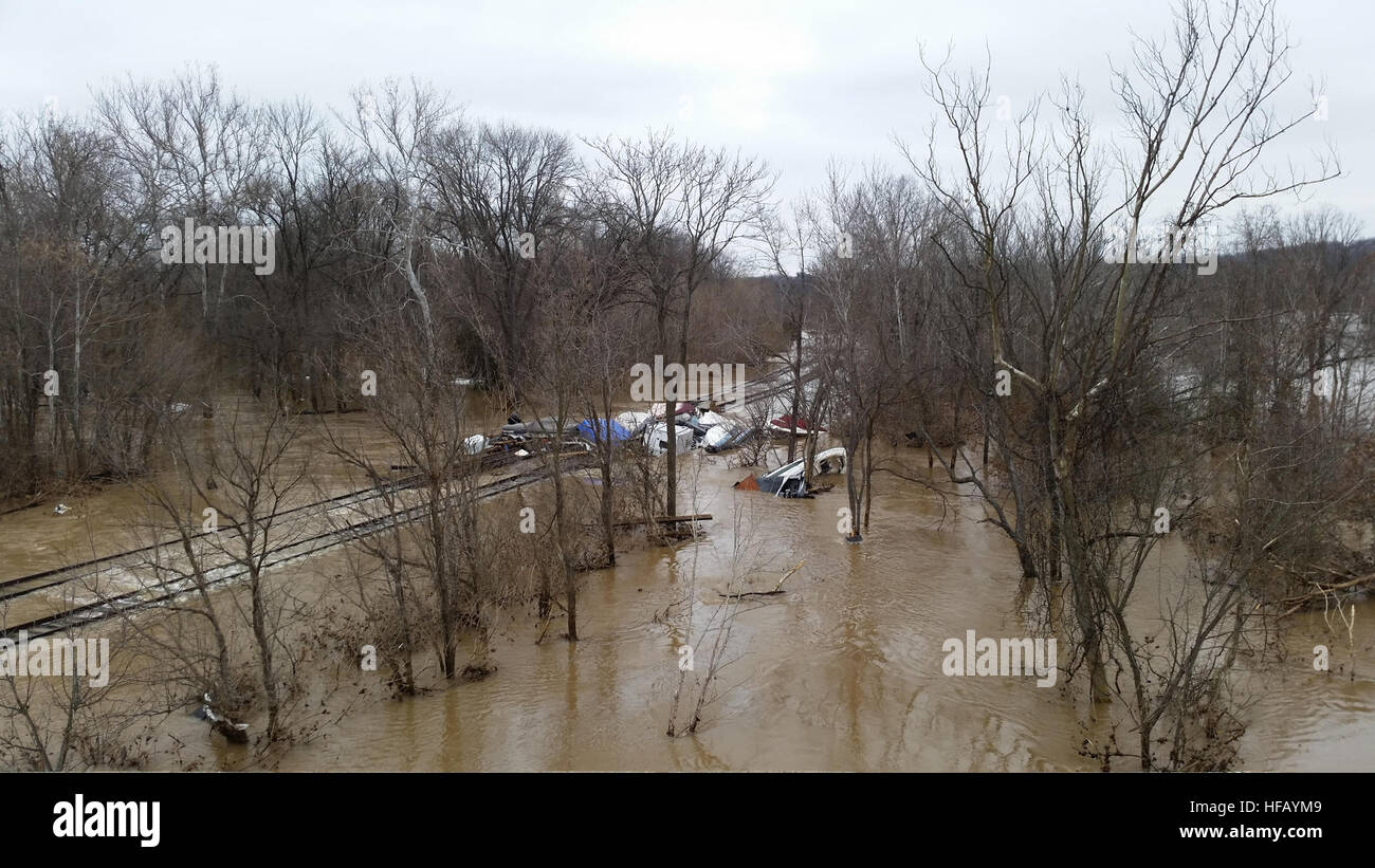 Flooding occurs when water overflows onto normally dry land, often as a ...