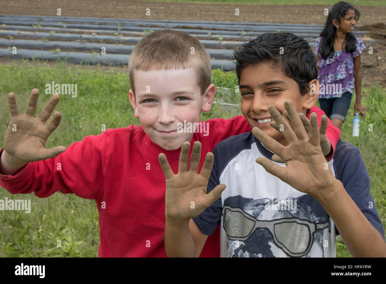 two boys proudly show off their dirty hands Stock Photo - Alamy two boys proudly show off their dirty hands Stock Photo - Alamy