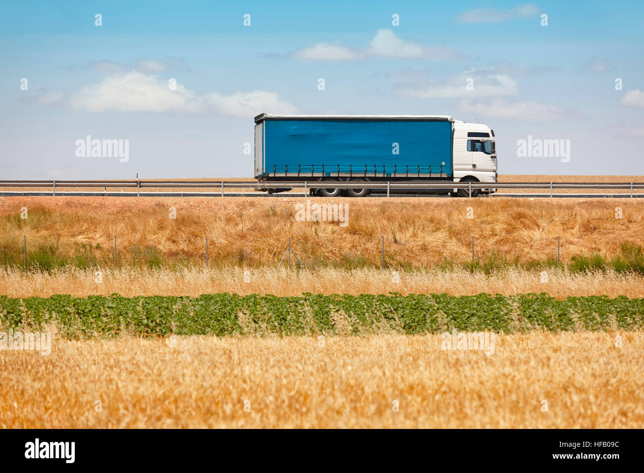 Blue truck on the road. Delivery cargo logistic. Horizontal Stock Photo ...