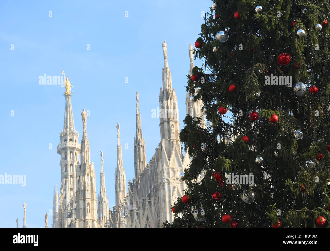 very big Christmas tree in front of the cathedral of milan in italy in ...