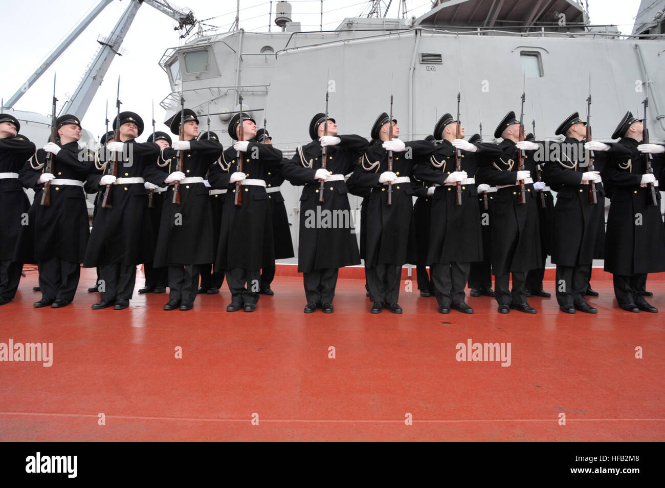 Russian navy honor guard welcomes a U.S. Navy admiral aboard the ...