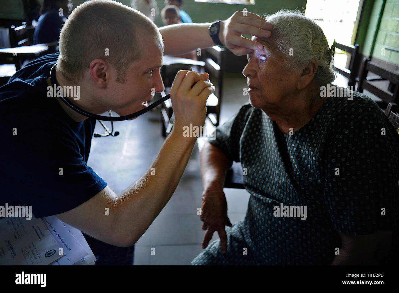 U.S. Navy Lt. Daniel Bowers, left, embarked aboard the amphibious ...