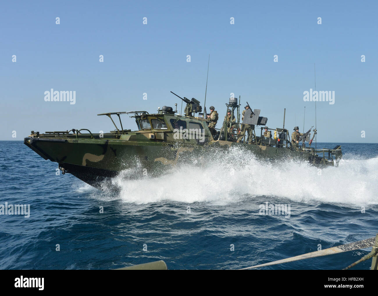 A Riverine Command Boat, assigned to Commander, Task Group 56.7.4 ...
