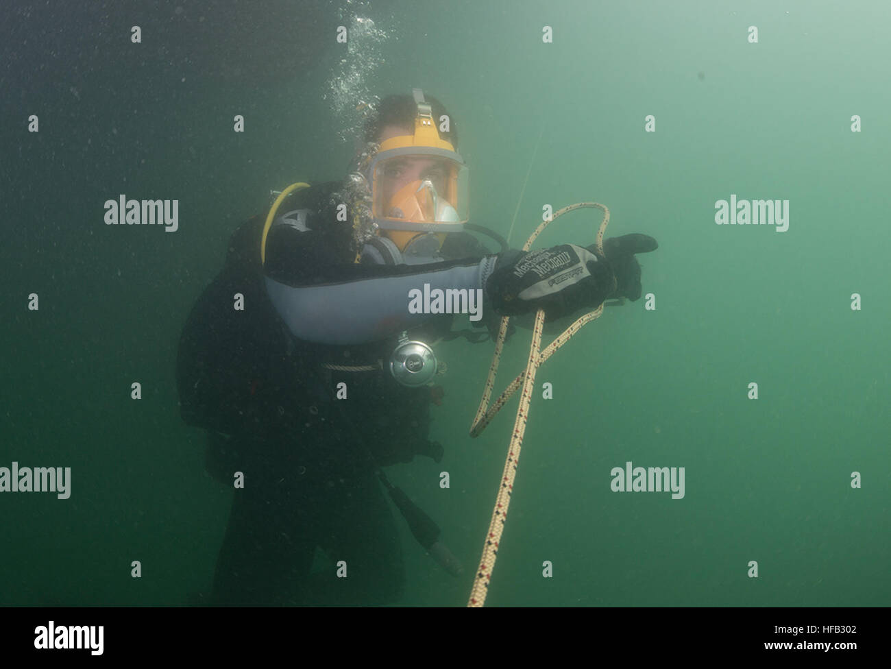 U.S. Navy Diver 2nd Class Nicholas Carson, assigned to Commander, Task ...