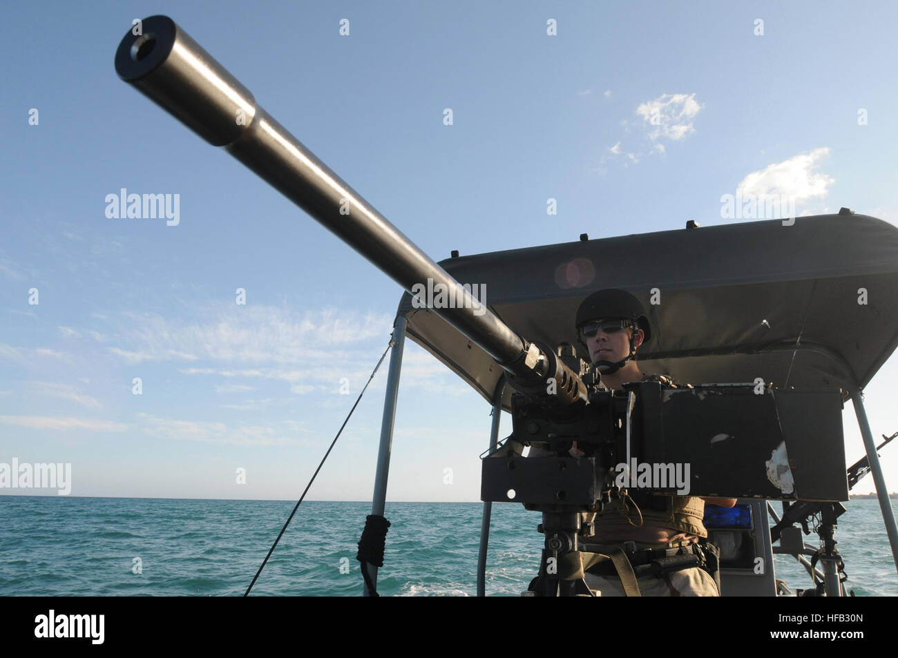 U.S. Coast Guard Petty Officer 3rd Class Ryan Lewis, a waterside ...