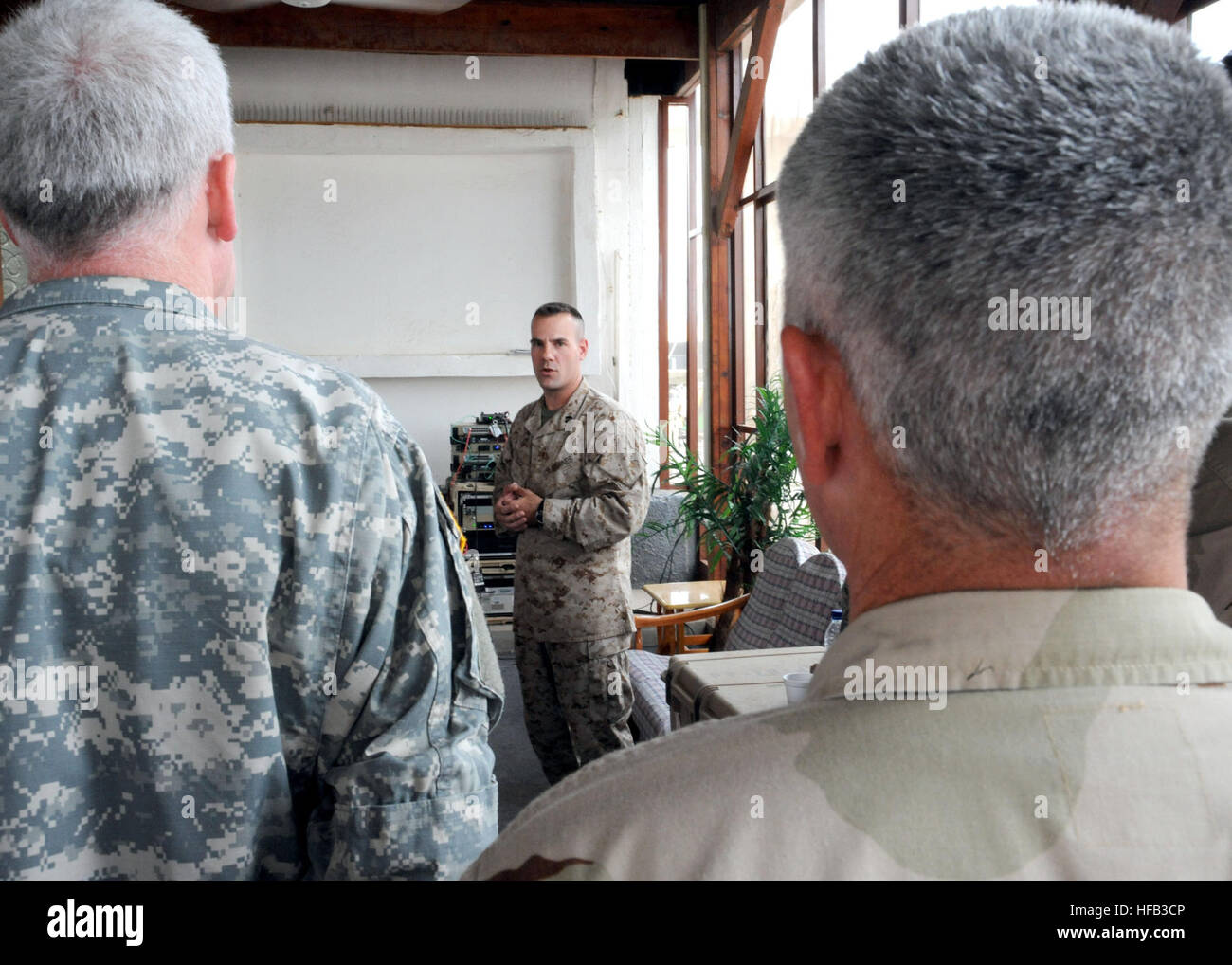 U.S. Marine Corps Capt. Michael Rock demonstrates the SIPRNET, NIPRNET ...