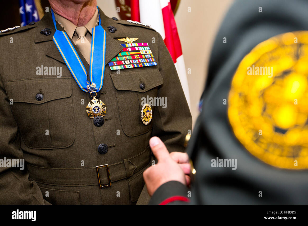 Commandant of the U.S. Marine Corps, Gen. James F. Amos, left, receives ...