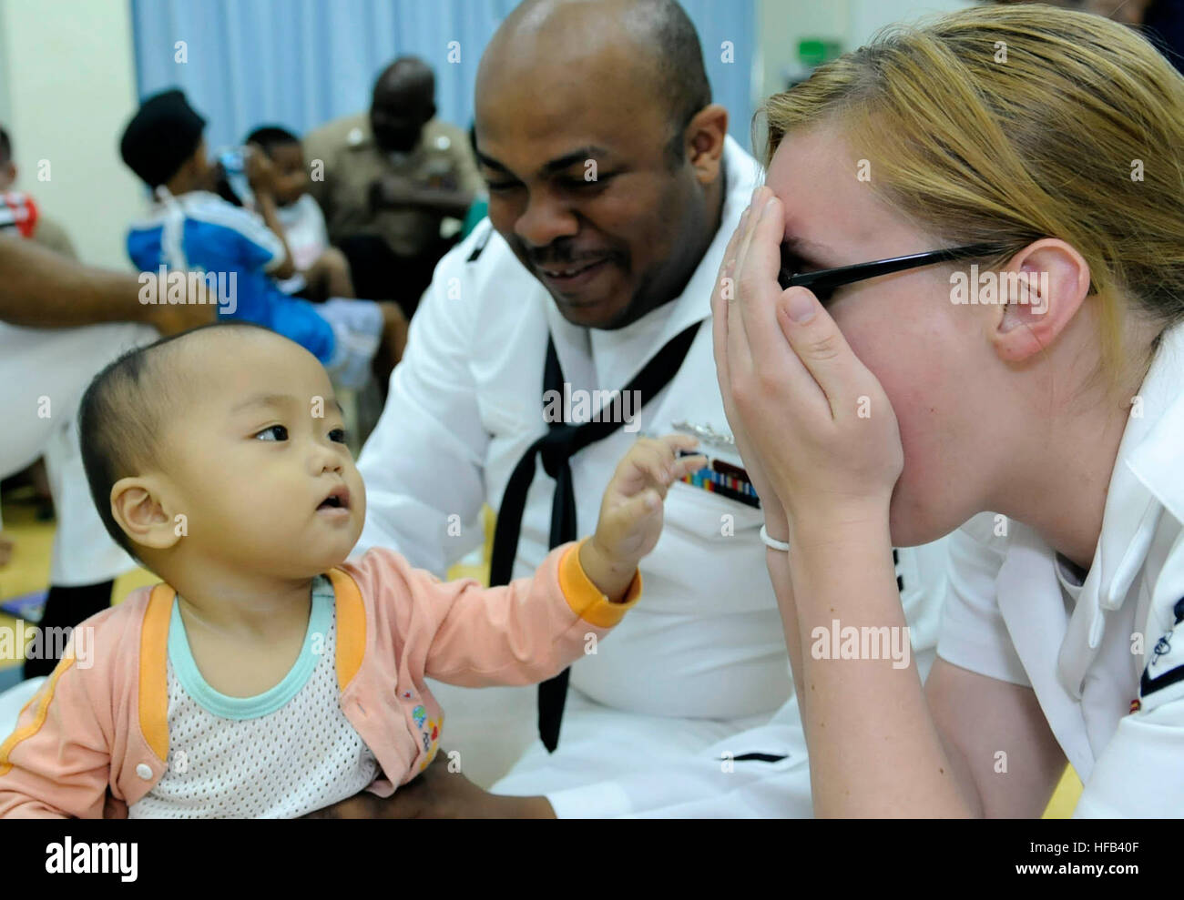 Petty Officer 2nd Class Reginald Harlmon, left, and Electronics ...