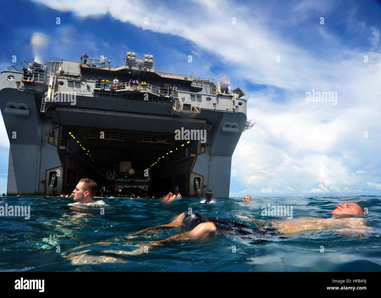 Service members embarked aboard the multipurpose amphibious assault ...