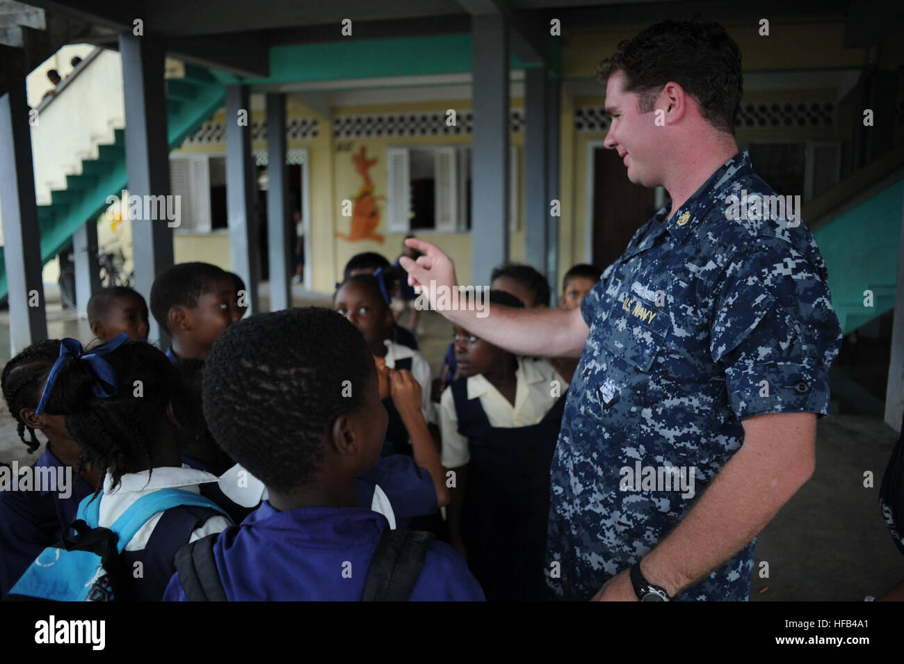 Andrew Chubb, hospital corpsman chief, shows local students what size ...