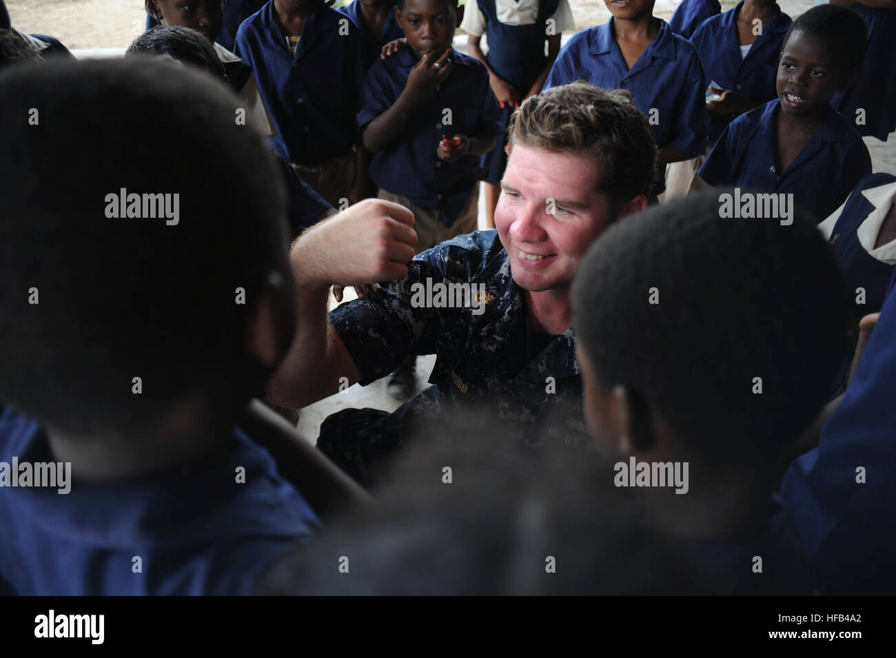 Andrew Chubb, hospital corpsman chief, talks to local student while ...
