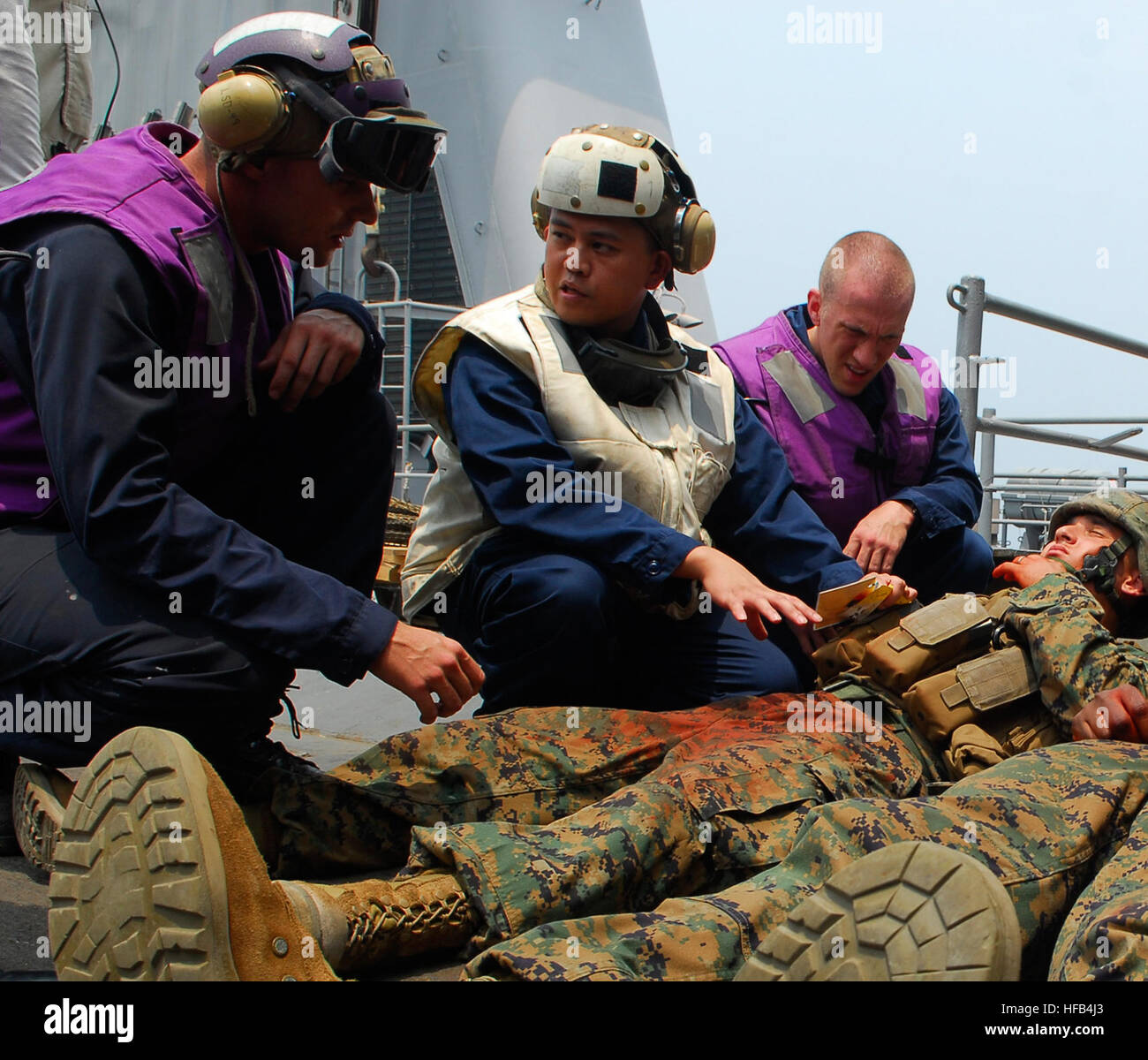Petty Officer 1st Class Jason Amos, hospital corpsman, assigned to the ...