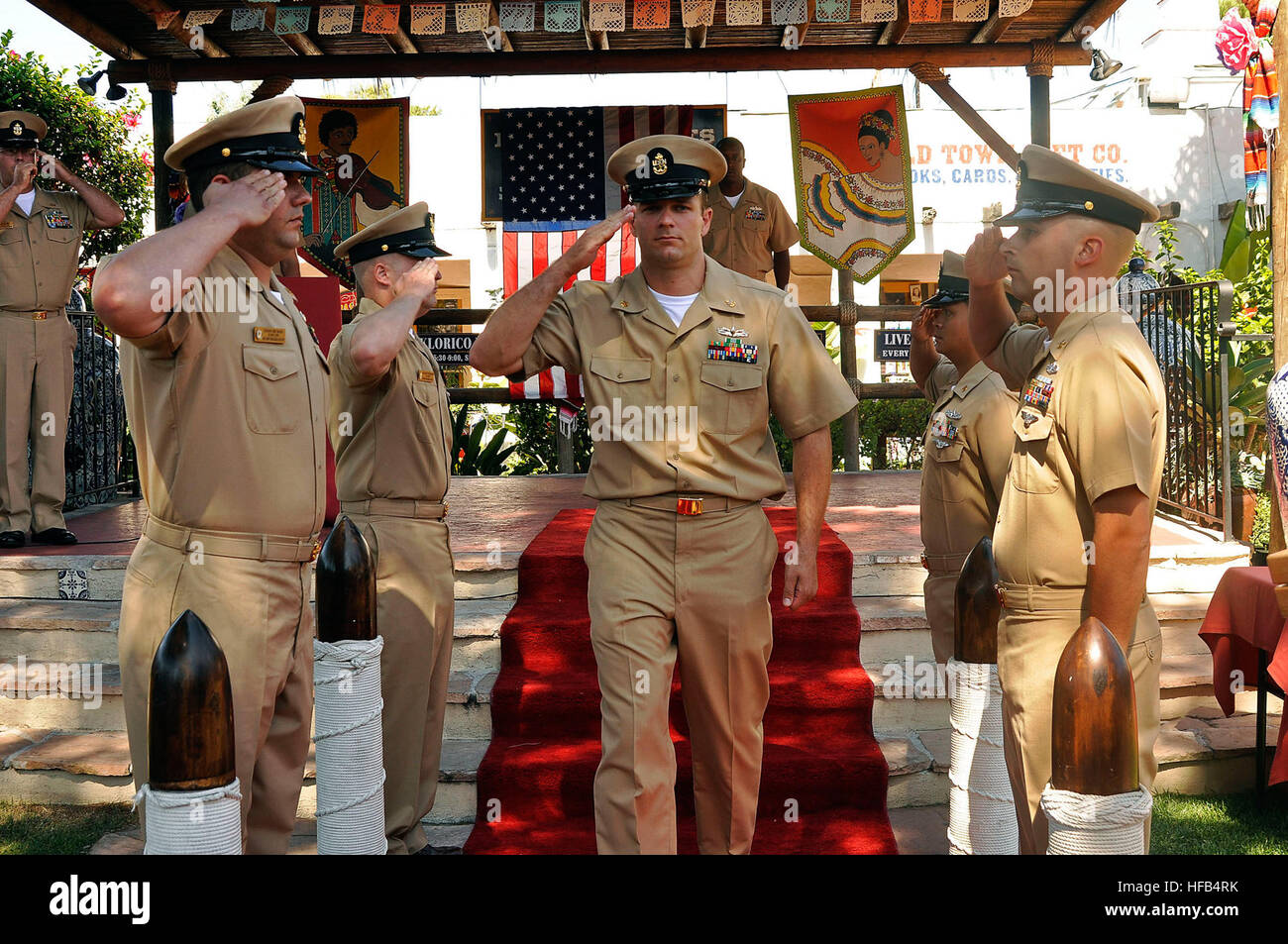 U.S. Navy Chief Hull Maintenance Technician James Reams returns the ...