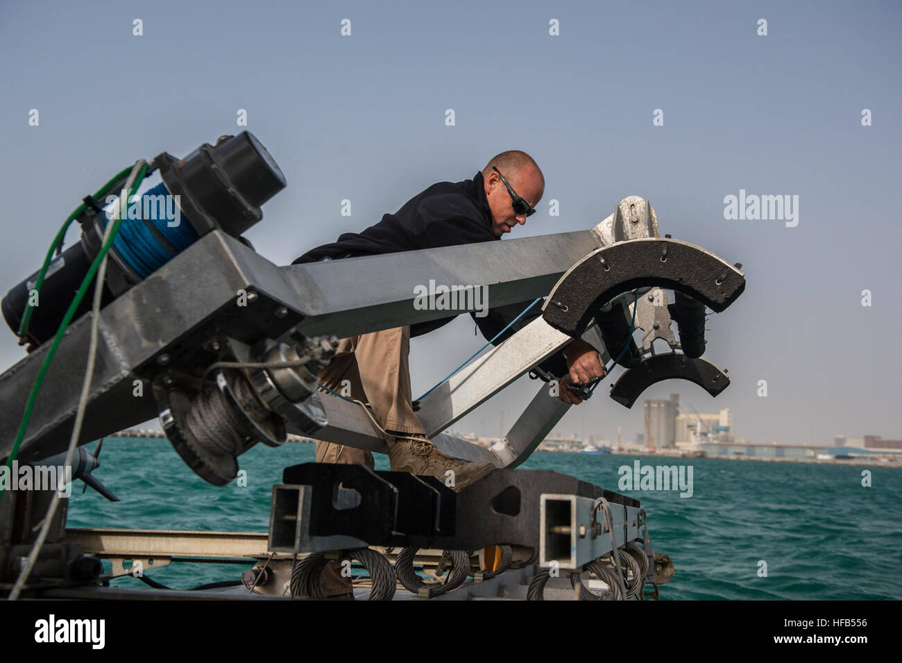 Unmanned underwater vehicle operator Kerry Coughlin, attached to ...