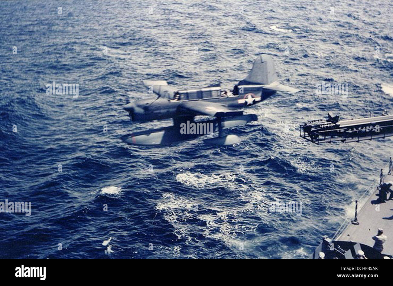Curtiss SO3C Seamew aircraft is catapulted from the USS Biloxi ...