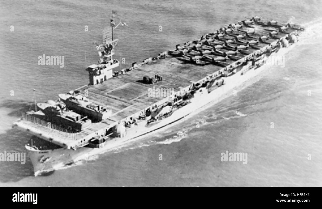 Sailors unload equipment from an Improved Navy Lighterage System (INLS ...