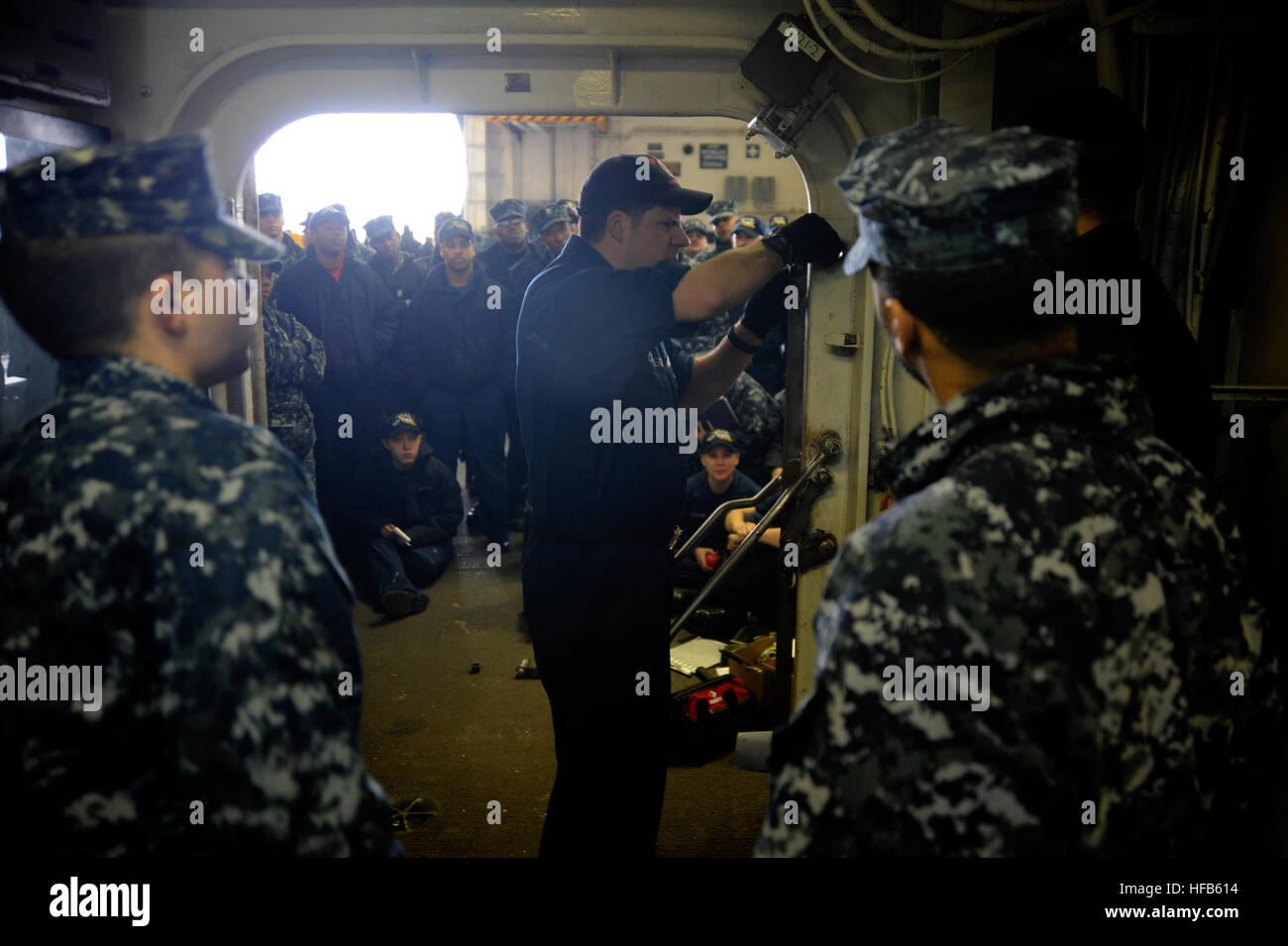 Damage Controlman 1st Class (SW/AW) Edward Carriero trains Sailors ...