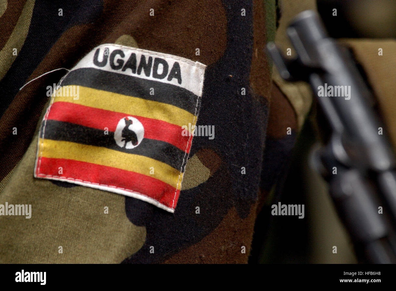 A Ugandan army soldier stands in formation during the opening ...