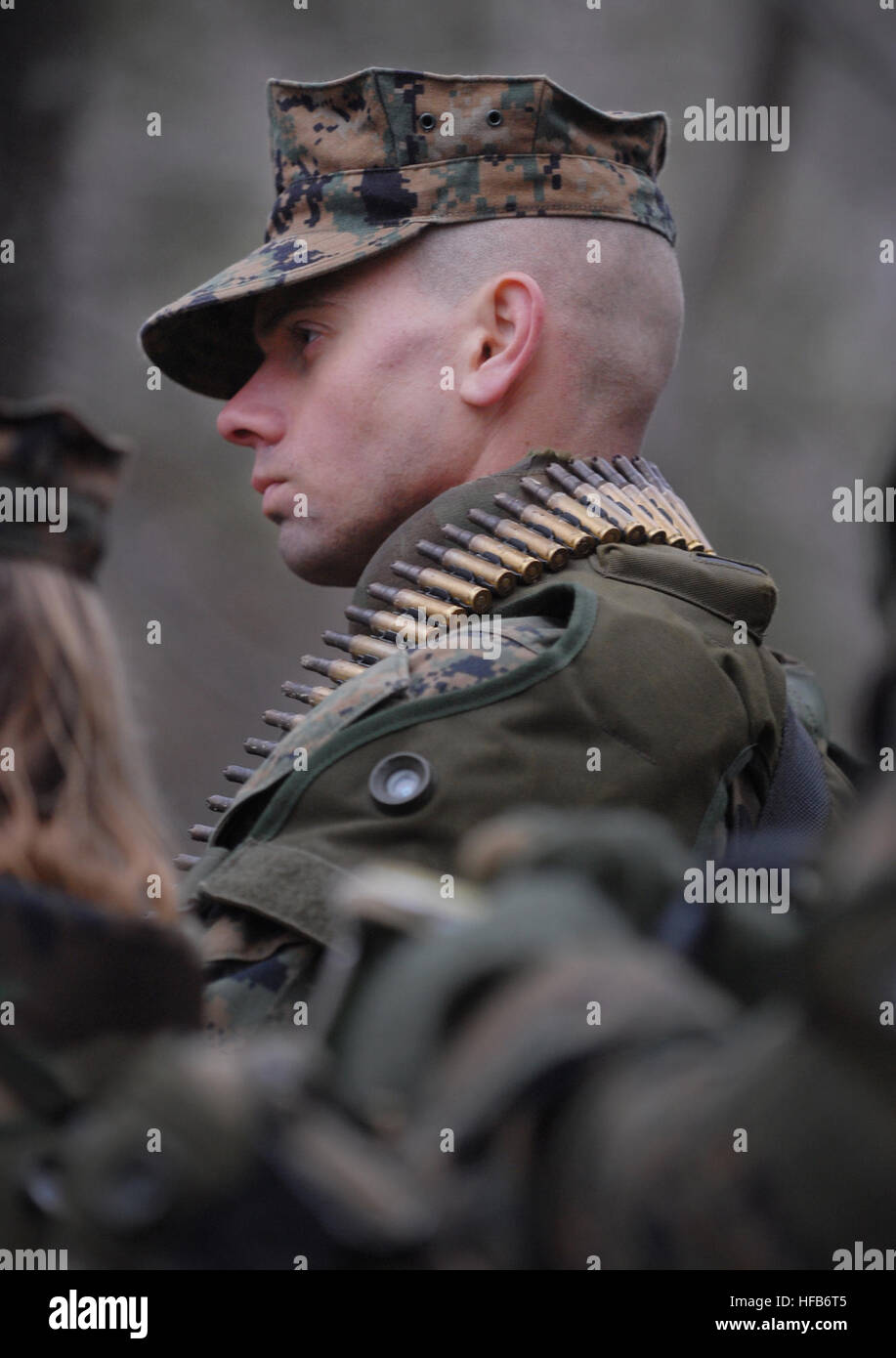 An enlisted Marine instructor listens during a brief on how to properly ...