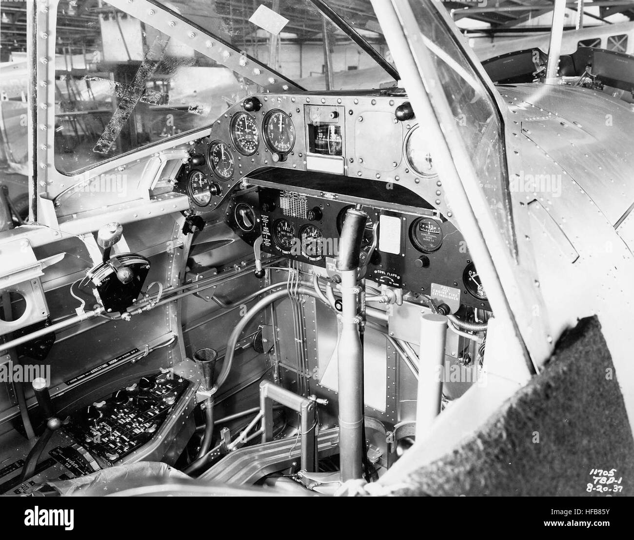 The Douglas TBD-1 aircraft cockpit is shown, highlighting ...