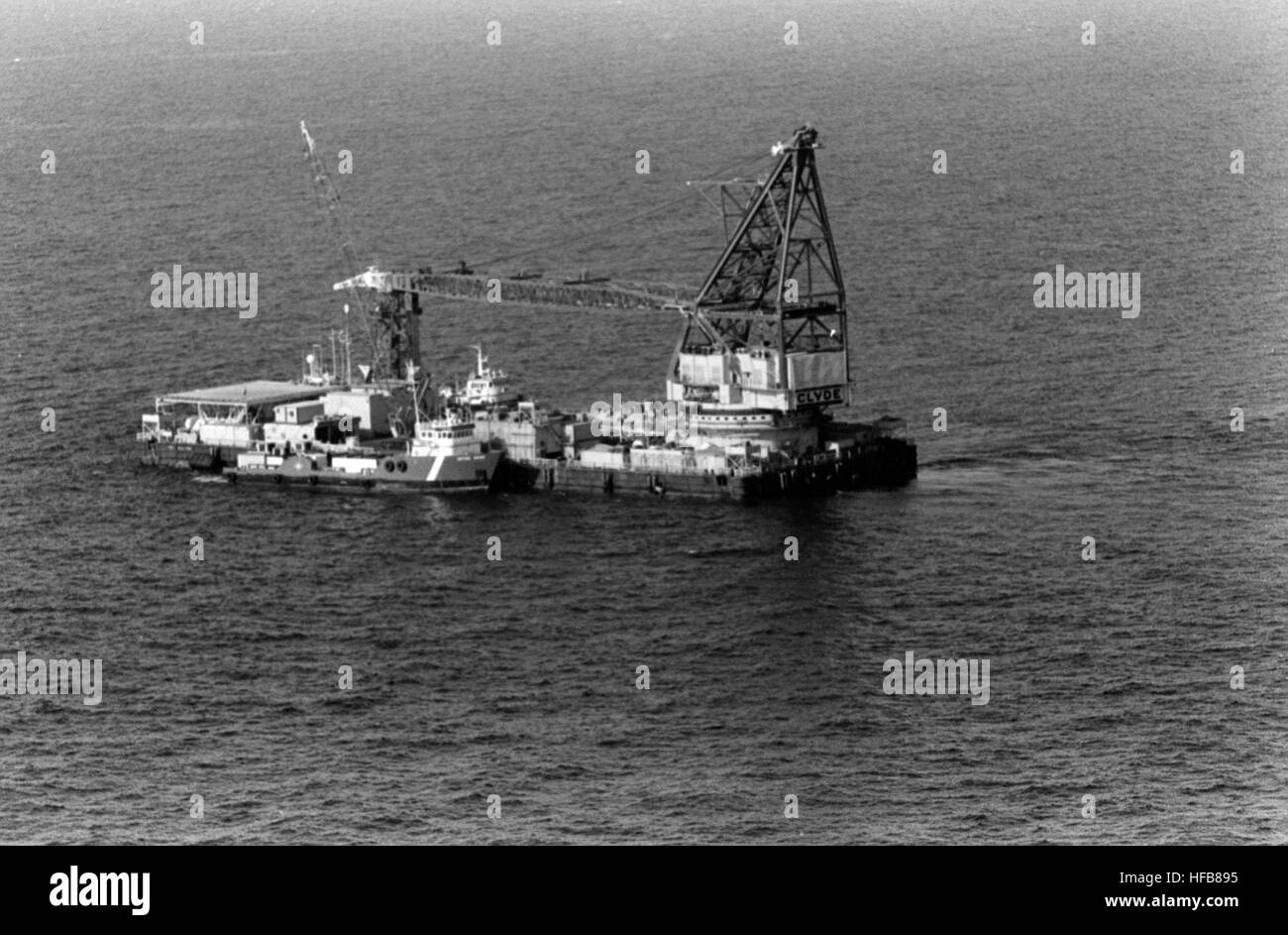 The barge Hercules alongside the tanker Inter Surf serves as a forward ...