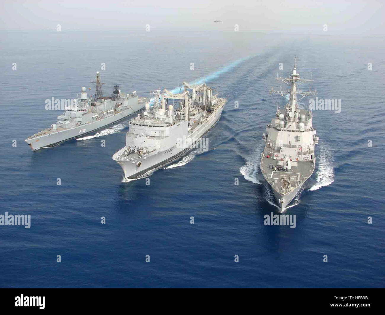 From left, German navy frigate FGS Emden (F 210), French navy tanker FS ...