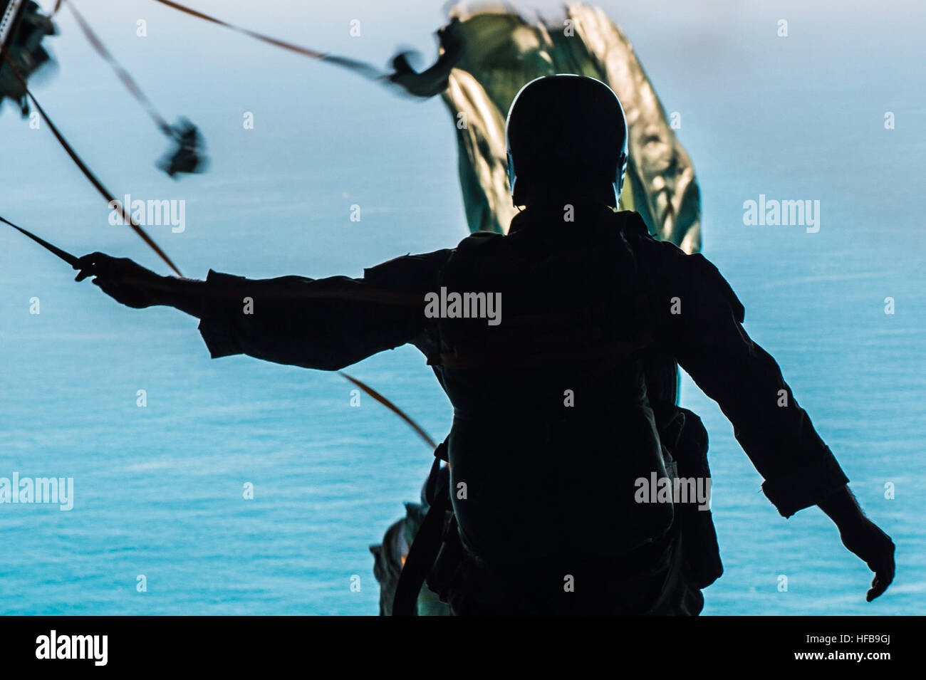 A member of Explosive Ordnance Disposal Mobile Unit (EODMU) 11 prepares ...