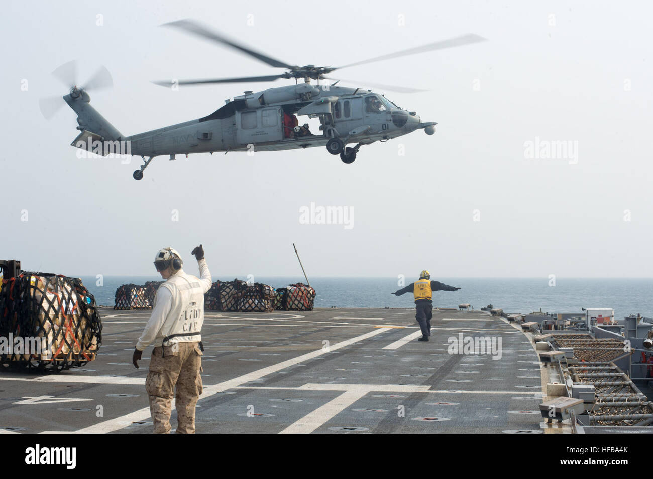 EAST CHINA SEA (April 03, 2014) – A MH-60S Nighthawk helicopter ...