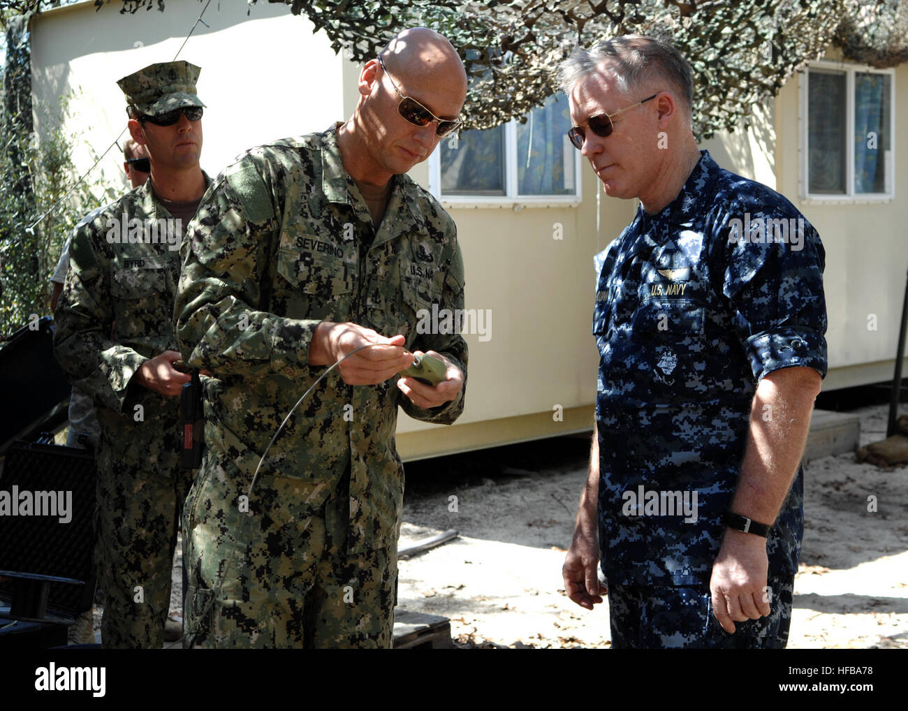 Rear Adm. Donald Quinn, right, commander of Naval Education and ...