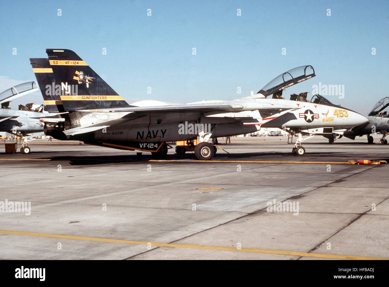 An F-14 A Tomcat aircraft of Fighter Squadron 124 (VF-124) is serviced ...