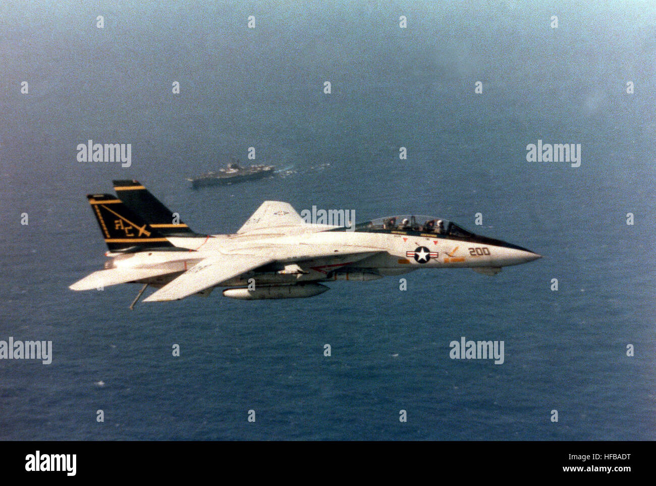 An air-to-air right side view of a Fighter Squadron 32 (VF-32) F-14A ...