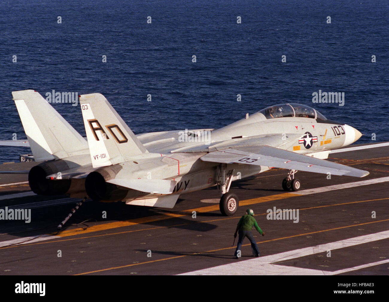 A right rear view of an F-14 Tomcat from Fighter Squadron 101 (VF-101) completing a successful ...