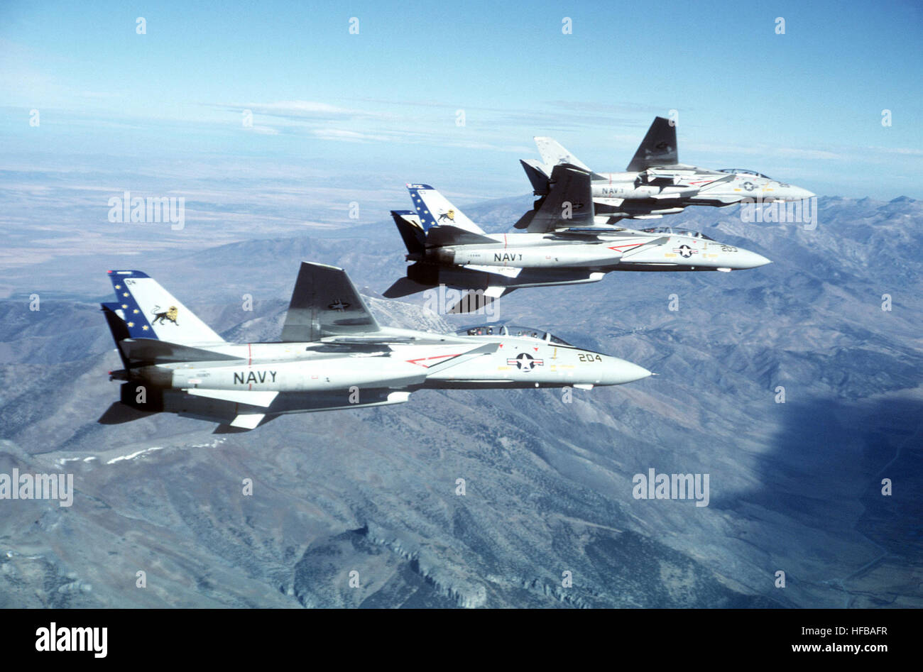 Three F-14A Tomcat aircraft from Fighter Squadron 213 (VF-213) fly in ...