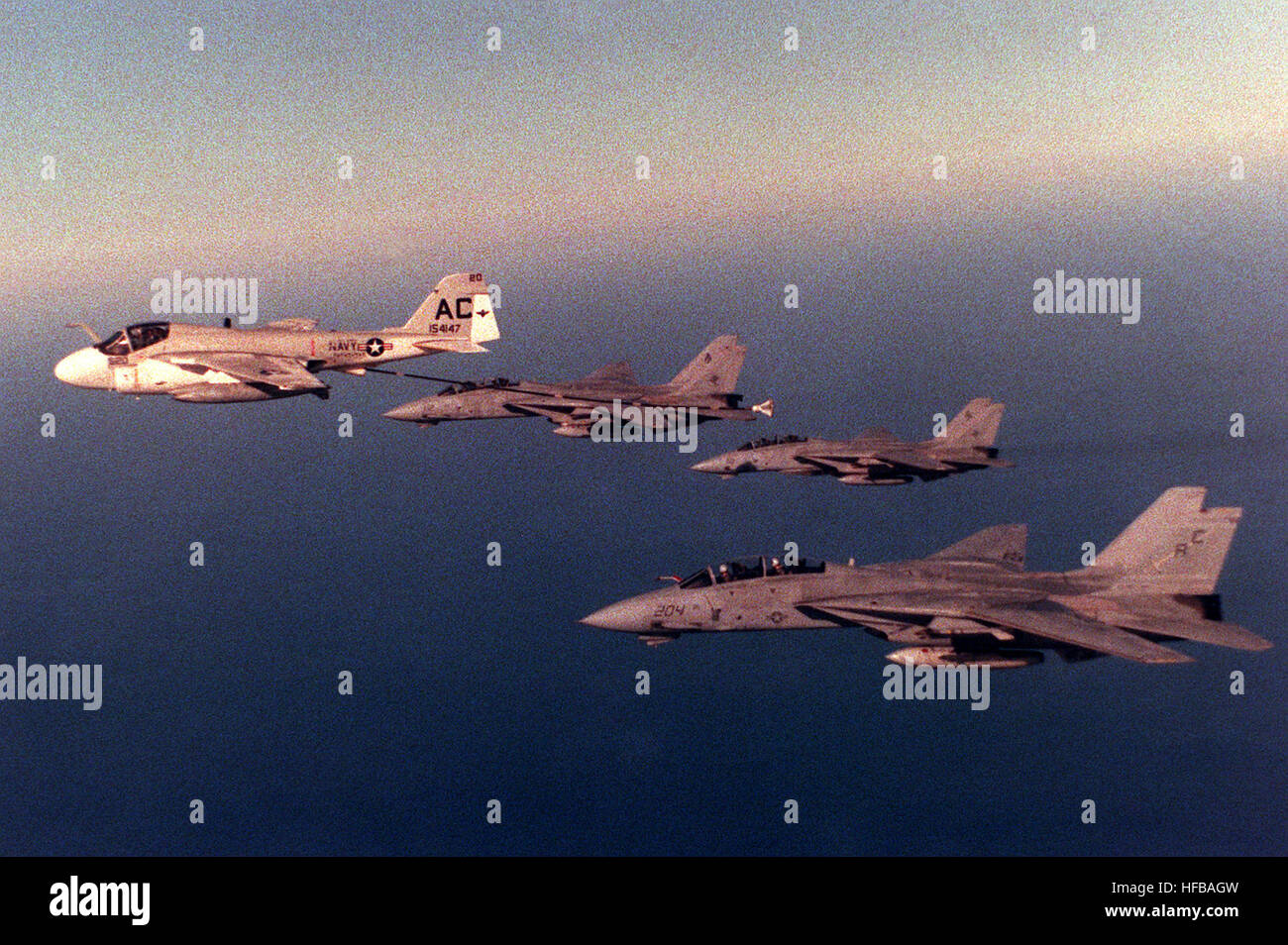 A Fighter Squadron 32 (VF-32) F-14A Tomcat aircraft, right foreground ...