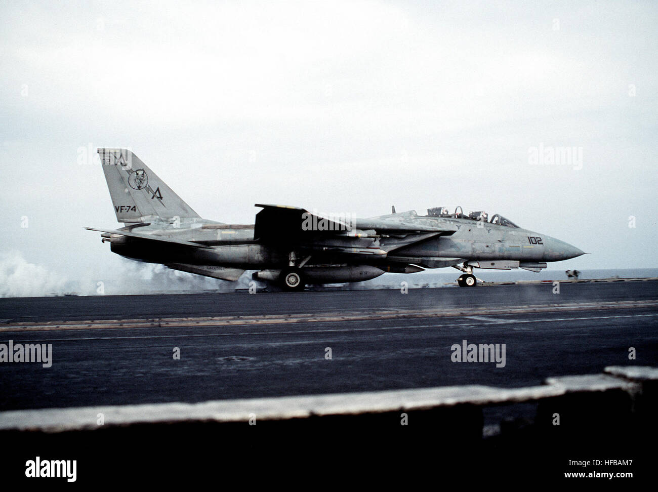 A Fighter Squadron 74 (VF-74) F-14A Tomcat aircraft rolls down the No ...