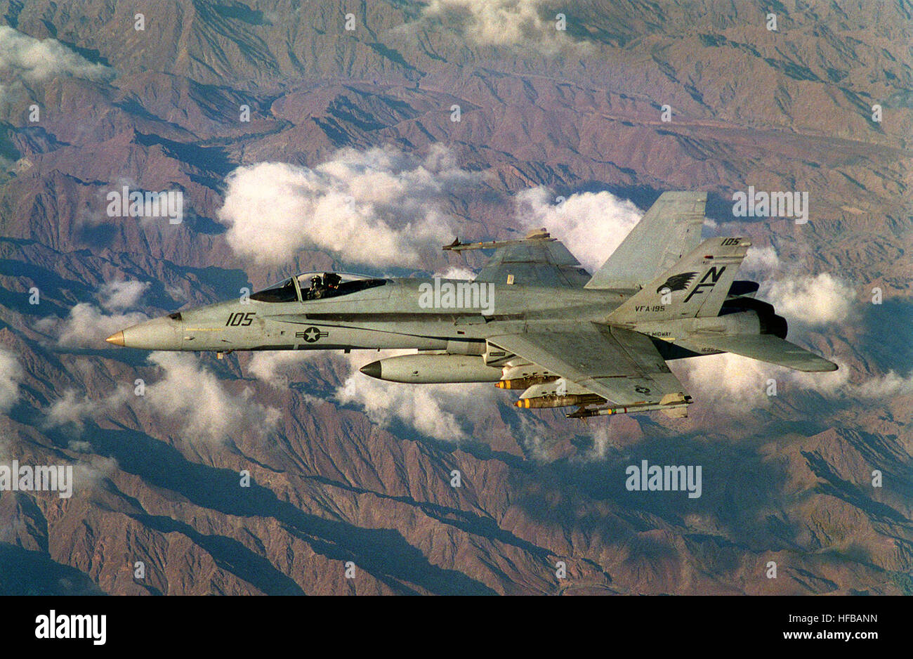 An air-to-air left side view of a Strike-Fighter-Squadron 195 (VFA-195 ...