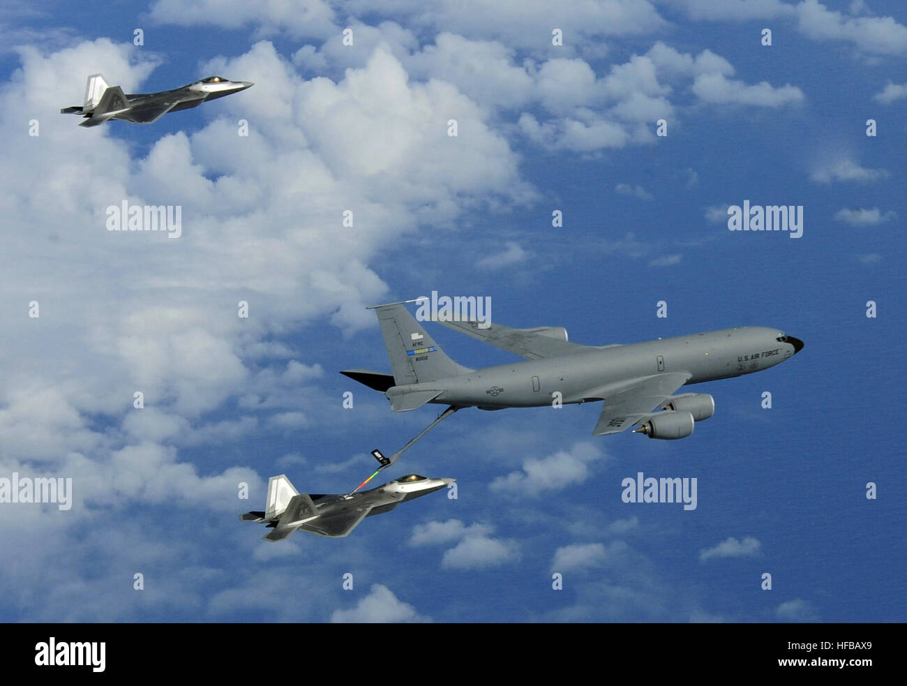 F-22A Raptor aircraft from the 90th Fighter Squadron receives in-flight ...
